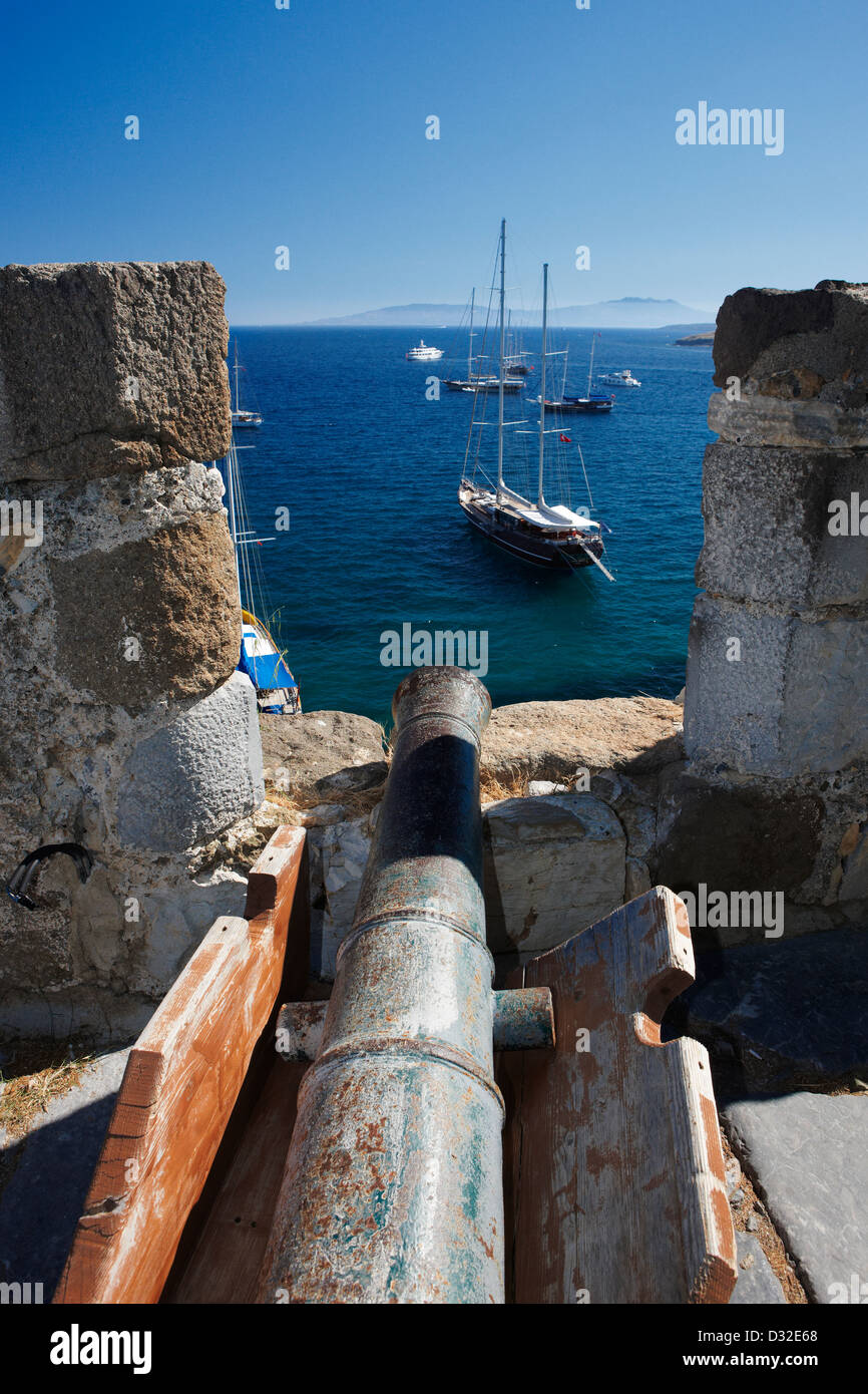 Old cannon in an embrasure on the outer wall of medieval Castle of The ...