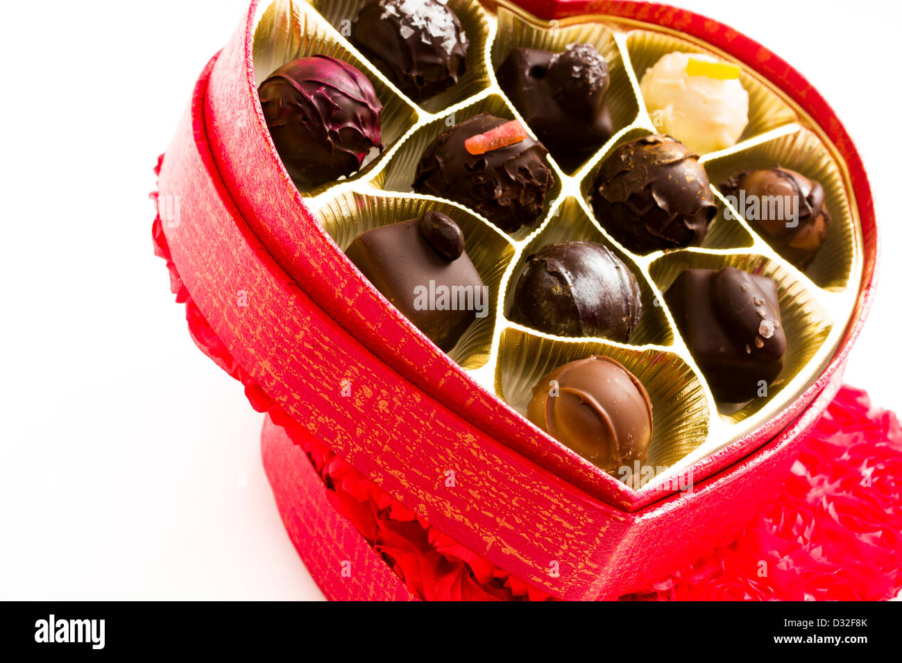 Fancy truffles in heart shaped boxes for Valentin's Day Stock Photo - Alamy
