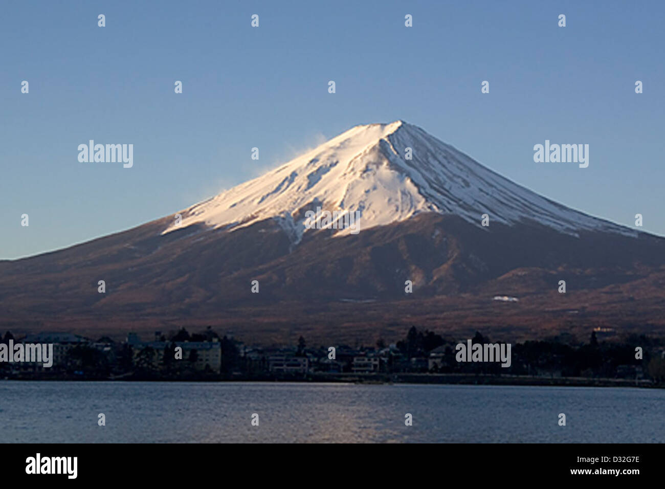 The sunrise over Mount Fuji, as seen from Kawaguchiko, offers a ...