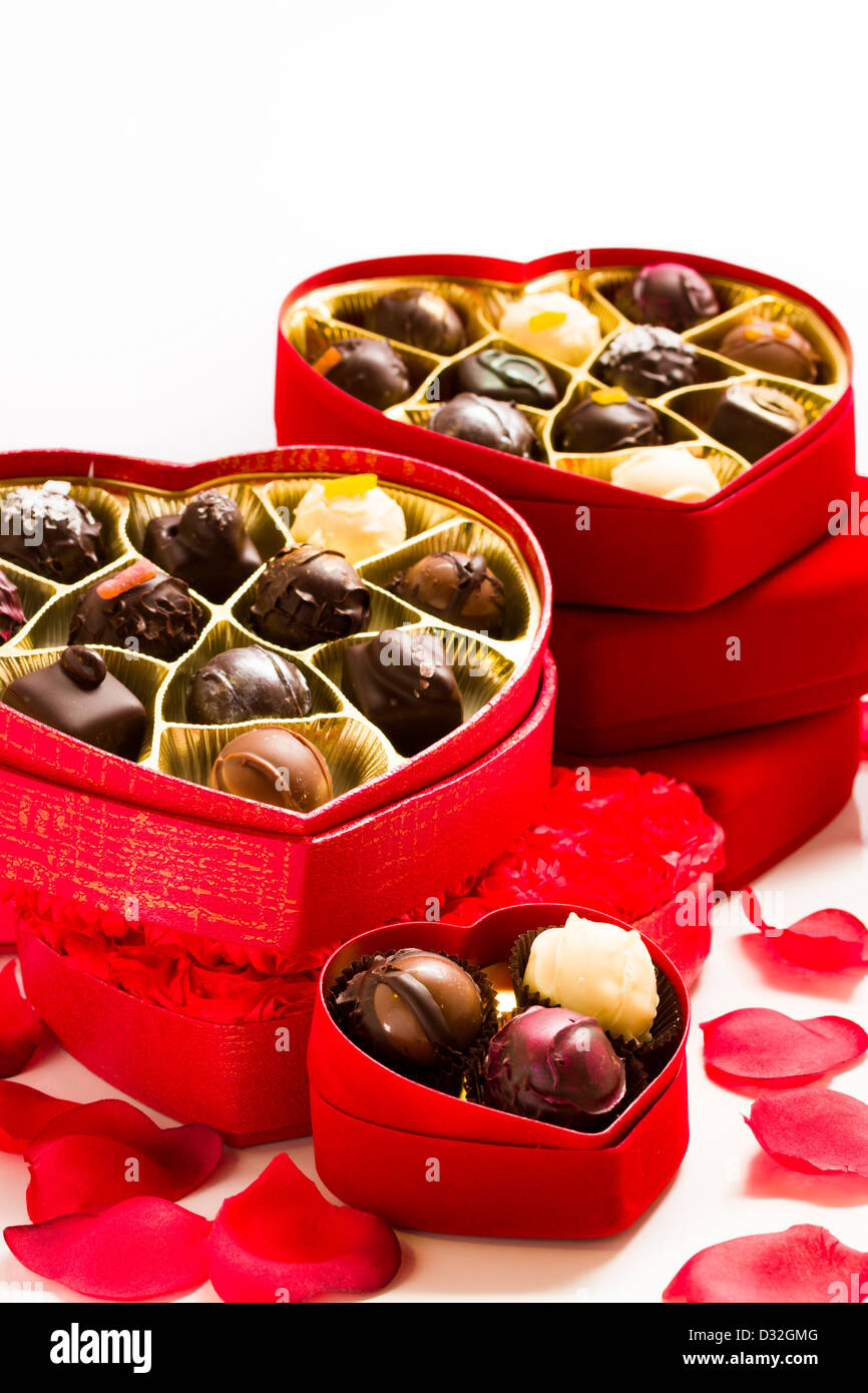 Fancy truffles in heart shaped boxes for Valentin's Day Stock Photo - Alamy