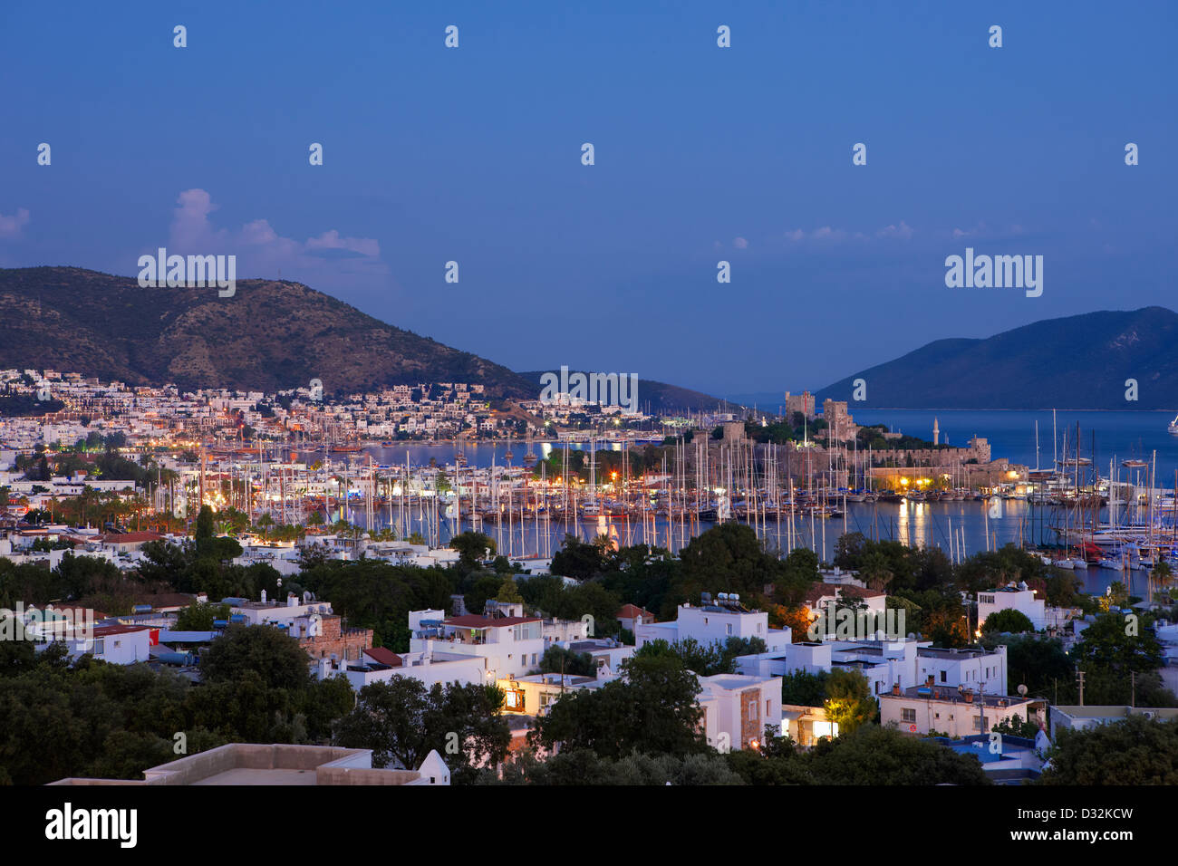Elevated view of Bodrum city illuminated at night. Bodrum, Mugla ...