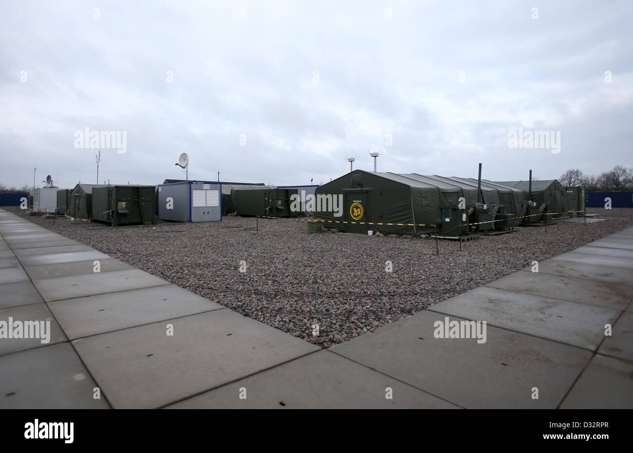 Tents and containers sit in a mobile command post at air field in Jagel ...