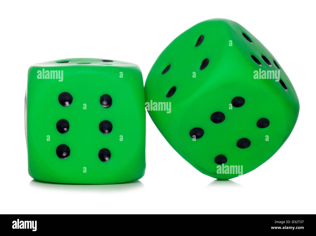 Two green dice studio cutout Stock Photo - Alamy