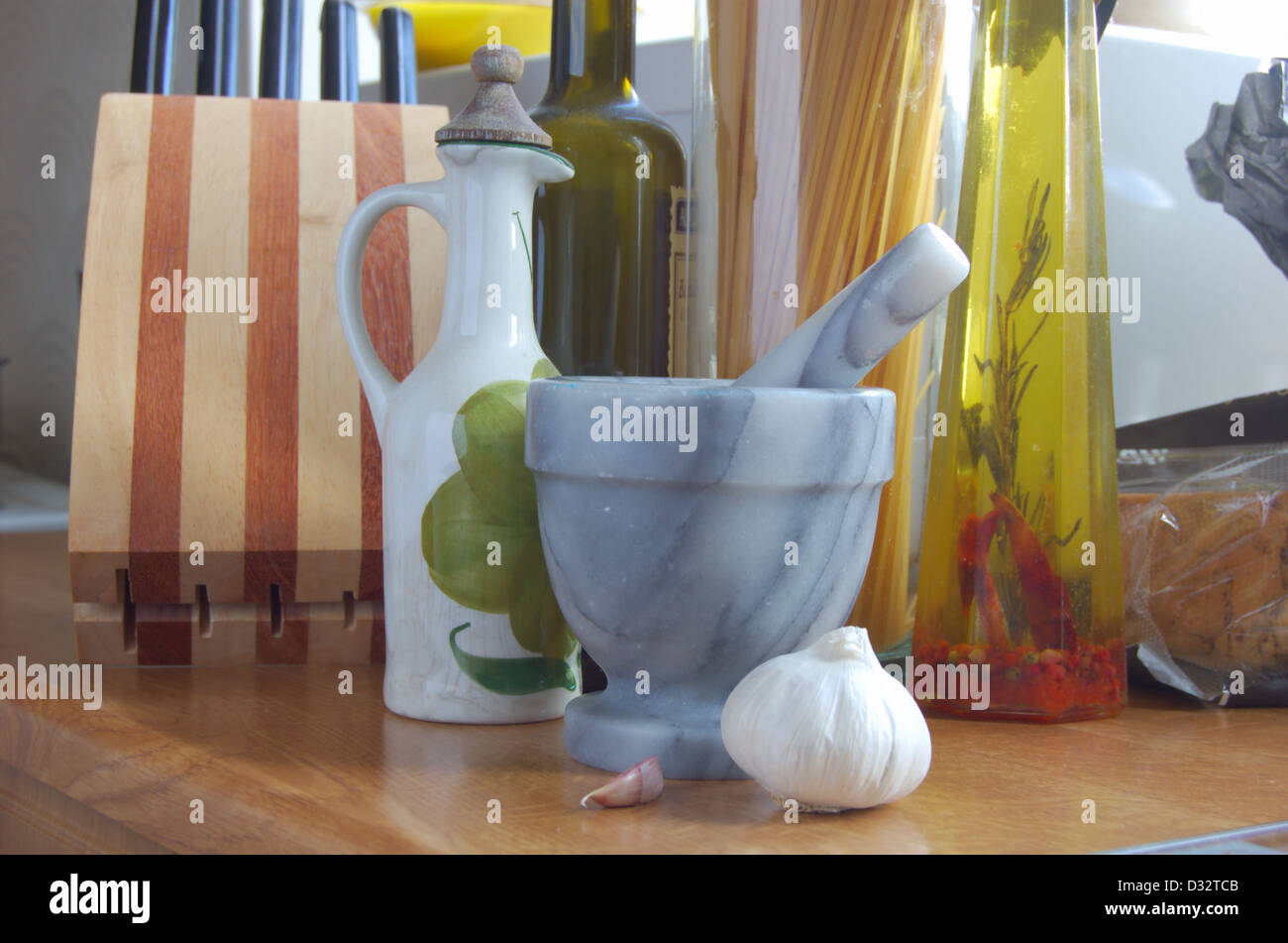 Assorted kitchen items arranged on counter Stock Photo - Alamy