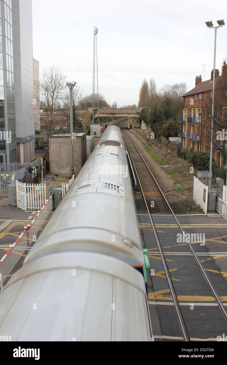 level train crossing Stock Photo - Alamy
