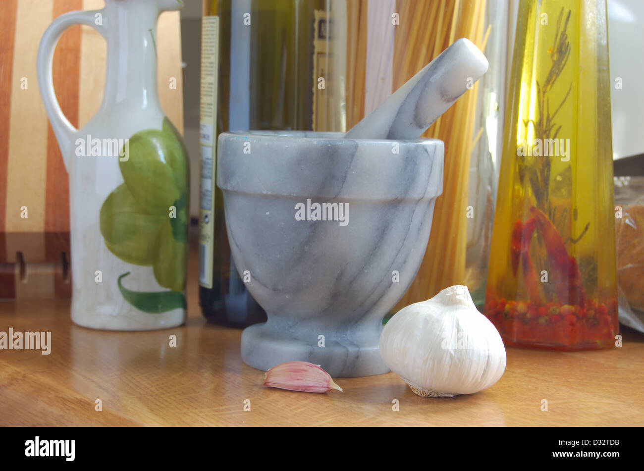 Assorted kitchen items arranged on counter Stock Photo - Alamy