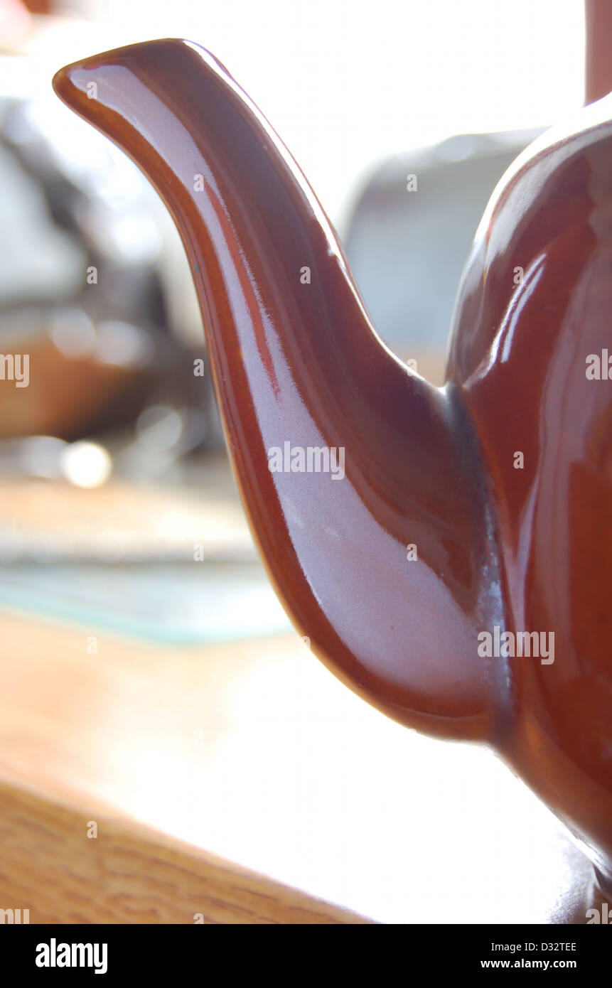 Spout of teapot on a kitchen counter Stock Photo - Alamy