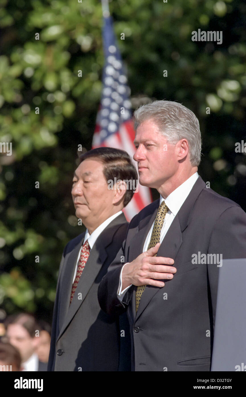 US President Bill Clinton and Chinese Premier Zhu Rongji stand at ...