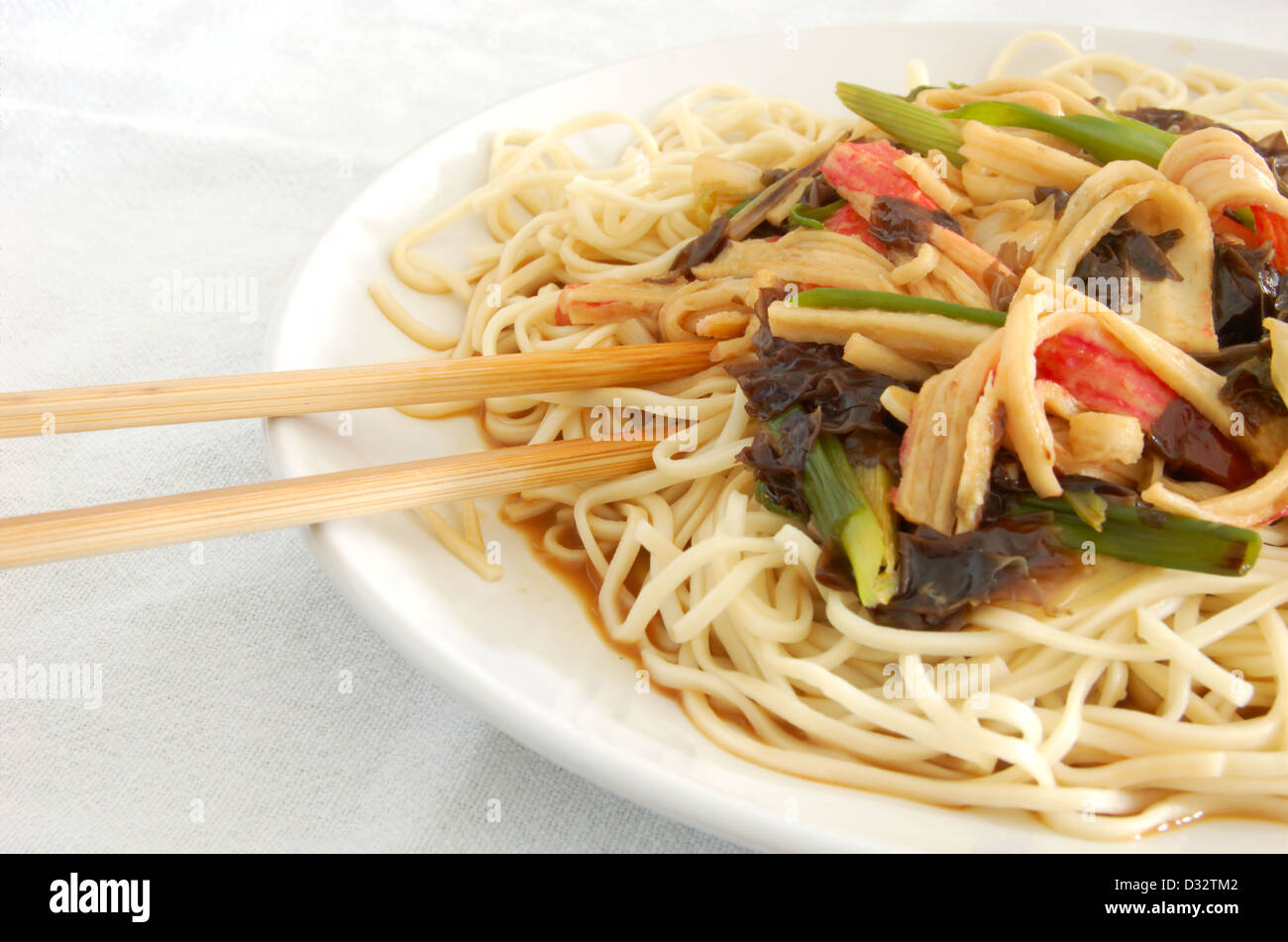 Plate of Japanese ramen noodles with seafood sauce Stock Photo - Alamy