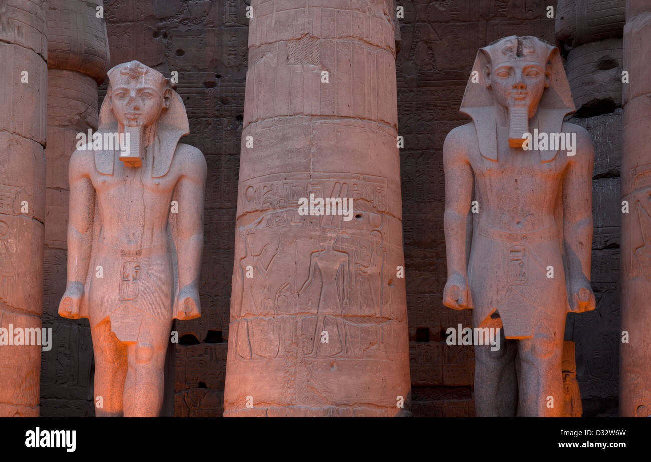 Statues of Ramses 2nd line the inner Court at Luxor Temple in Egypt ...