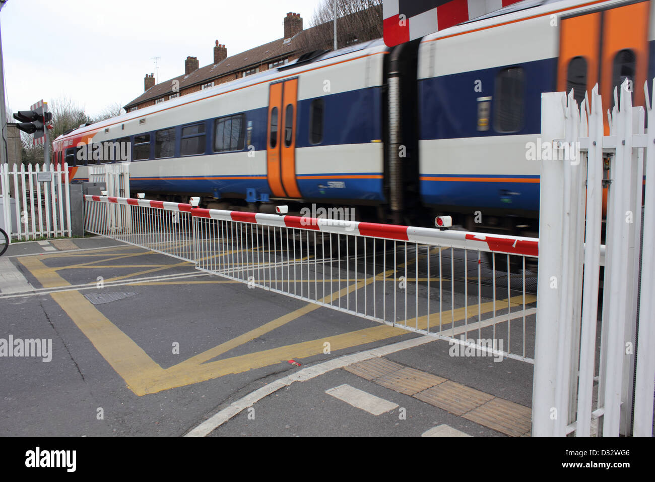 level train crossing Stock Photo - Alamy