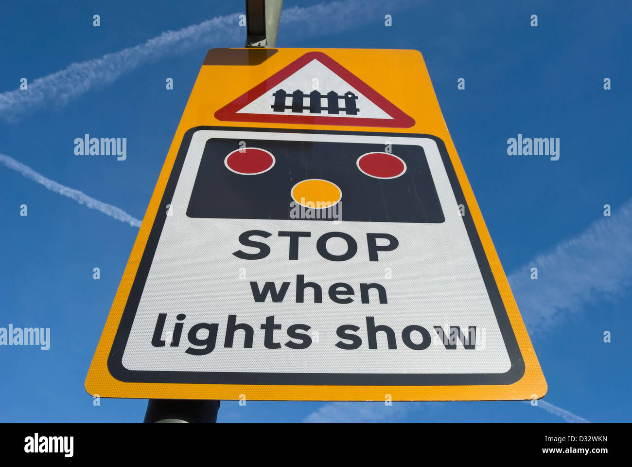 british road sign warning of railway crossing with lights, mortlake ...