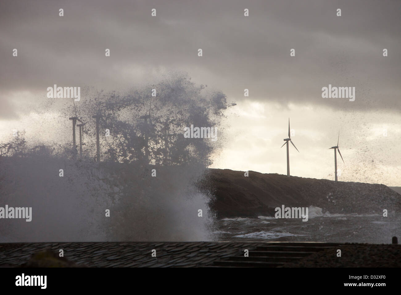 Gale force winds and crashing waves battering the coastal defences in ...