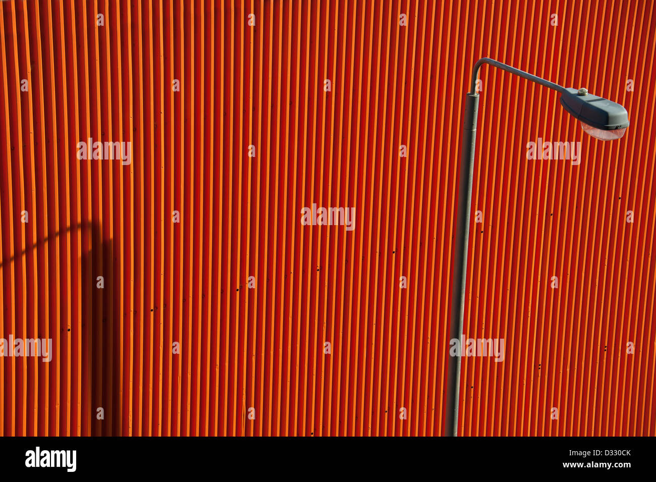 Orange Cladding and street light London Stock Photo - Alamy