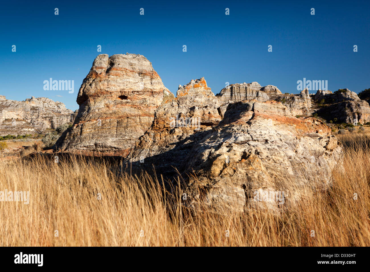 Madagascar, Parc National de l’Isalo, rocky escarpment at edge of park ...