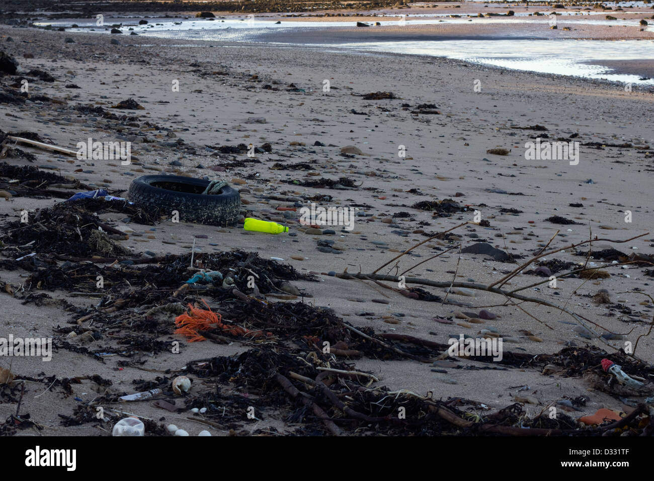 Waste washed up on a beach Stock Photo - Alamy