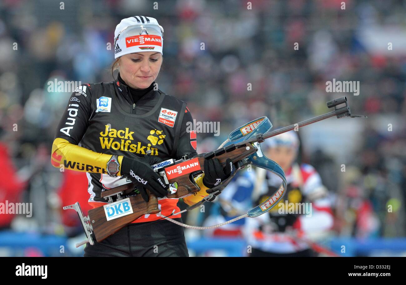Andrea Henkel of Germany competes at the shooting range during the ...