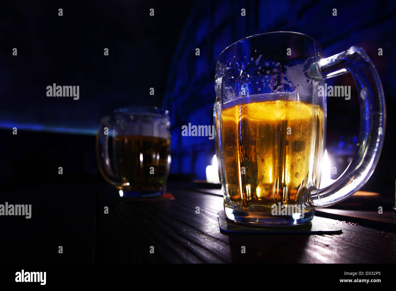 beer in dark room close up Stock Photo - Alamy