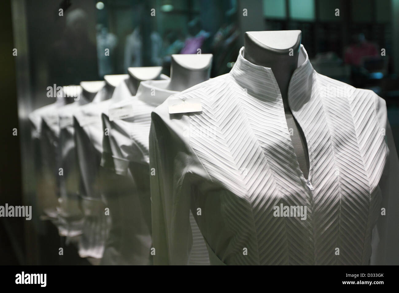 showcase with white clothes Stock Photo - Alamy