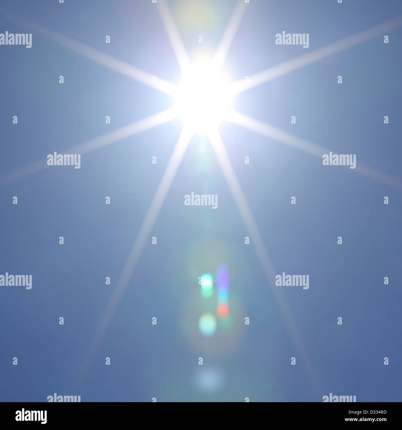 sun in blue day sky Stock Photo - Alamy