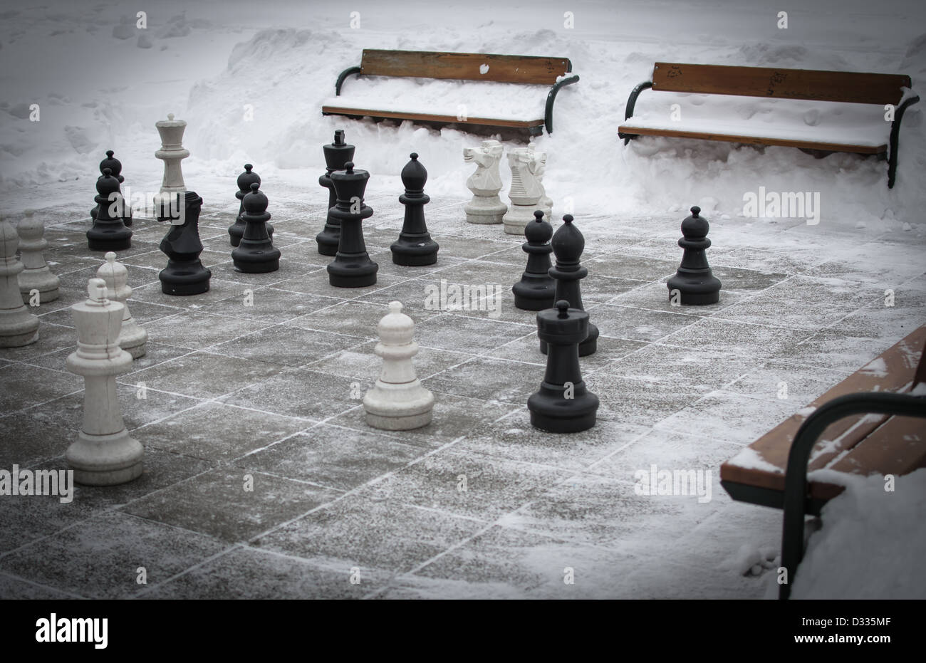 Big Outdoor Chess Board In Snow Covered Park Stock Photo - Alamy