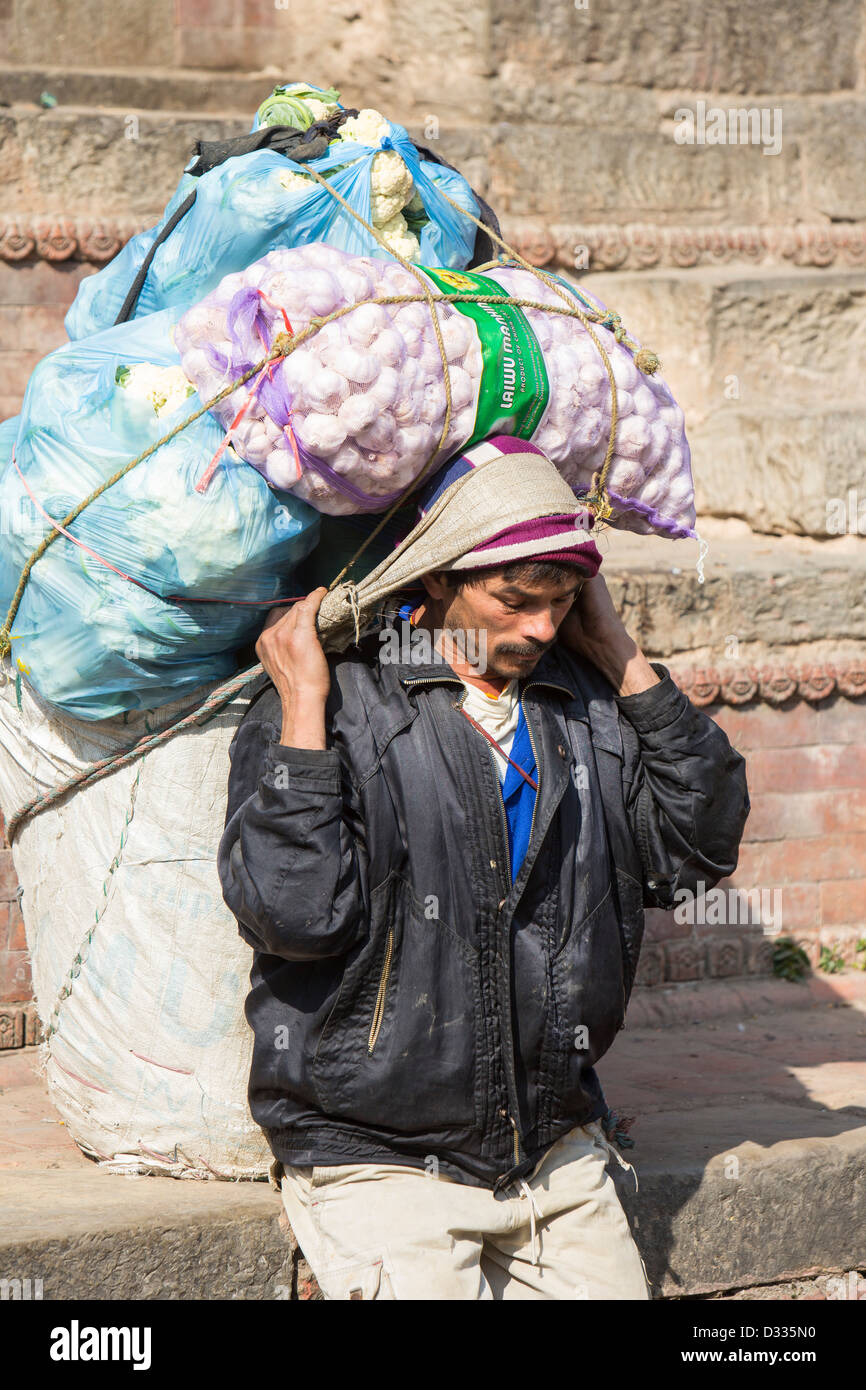 A man with a huge heavy load in Kathmandu, Nepal Stock Photo - Alamy