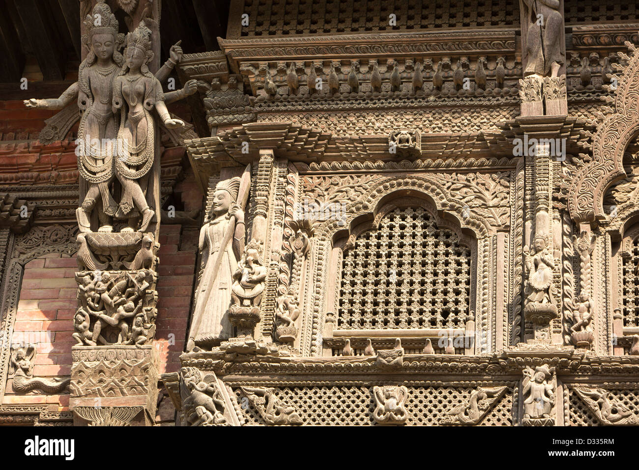 Ancient, ornately carved wood window frames on an old building in ...