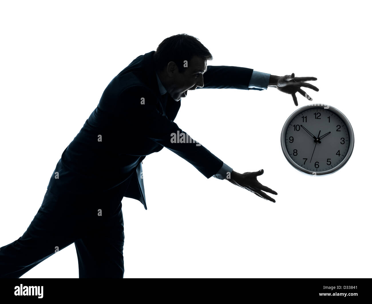 one businessman running after time in silhouette studio isolated on ...