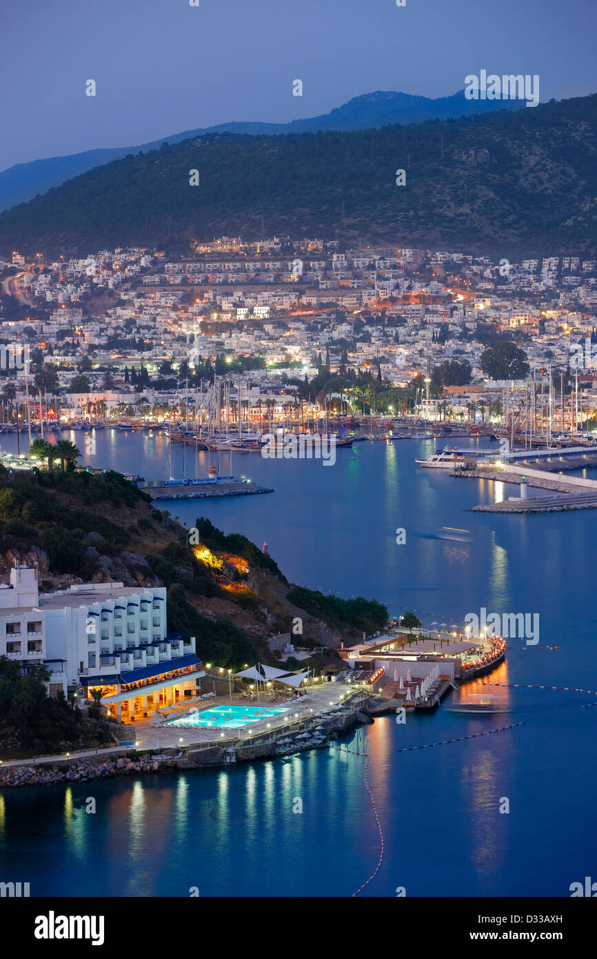 Elevated view of Bodrum city and harbour illuminated at night. Bodrum ...