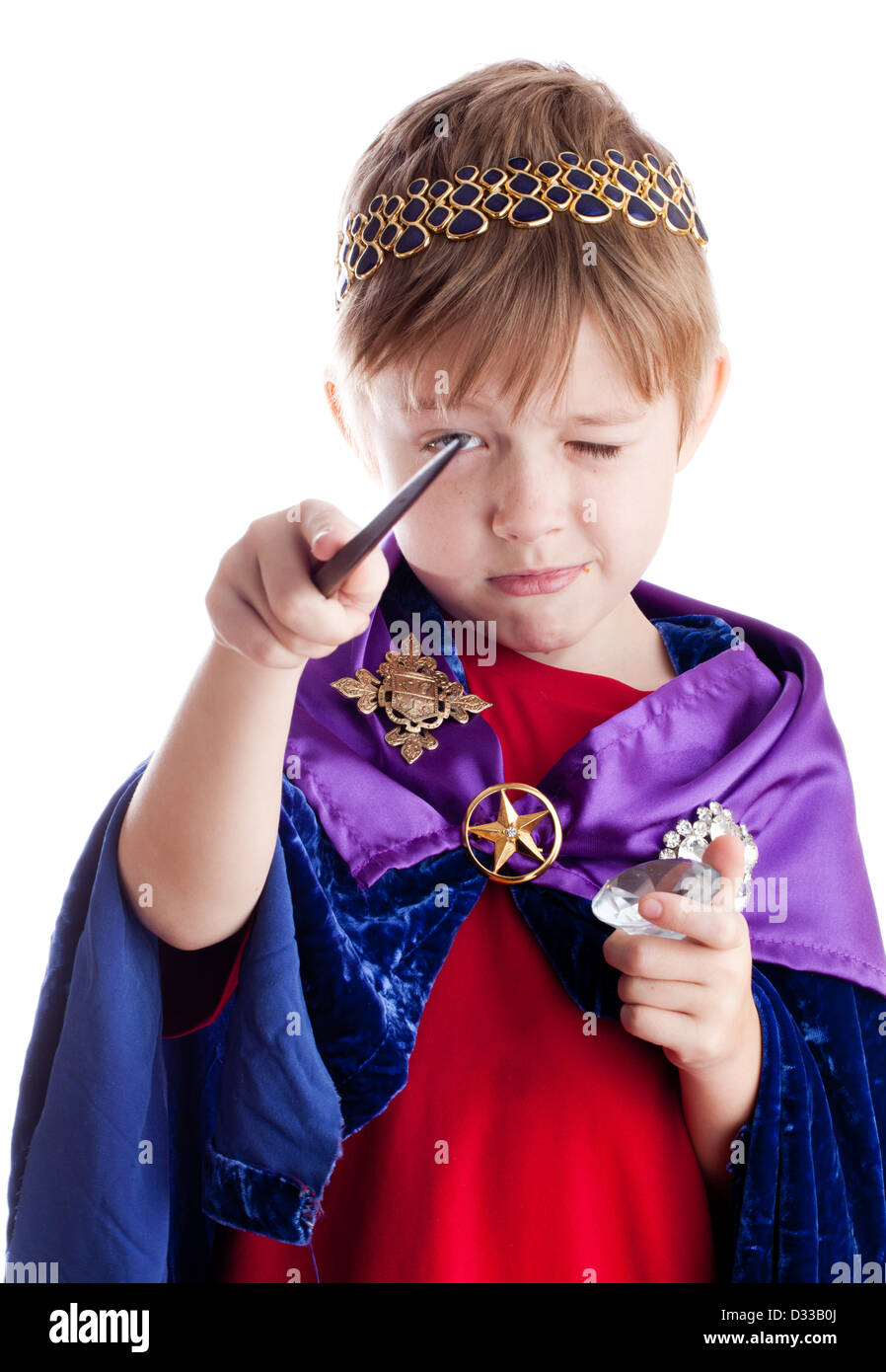 little boy pretends to be wizard king casts spell with magic wand Stock ...