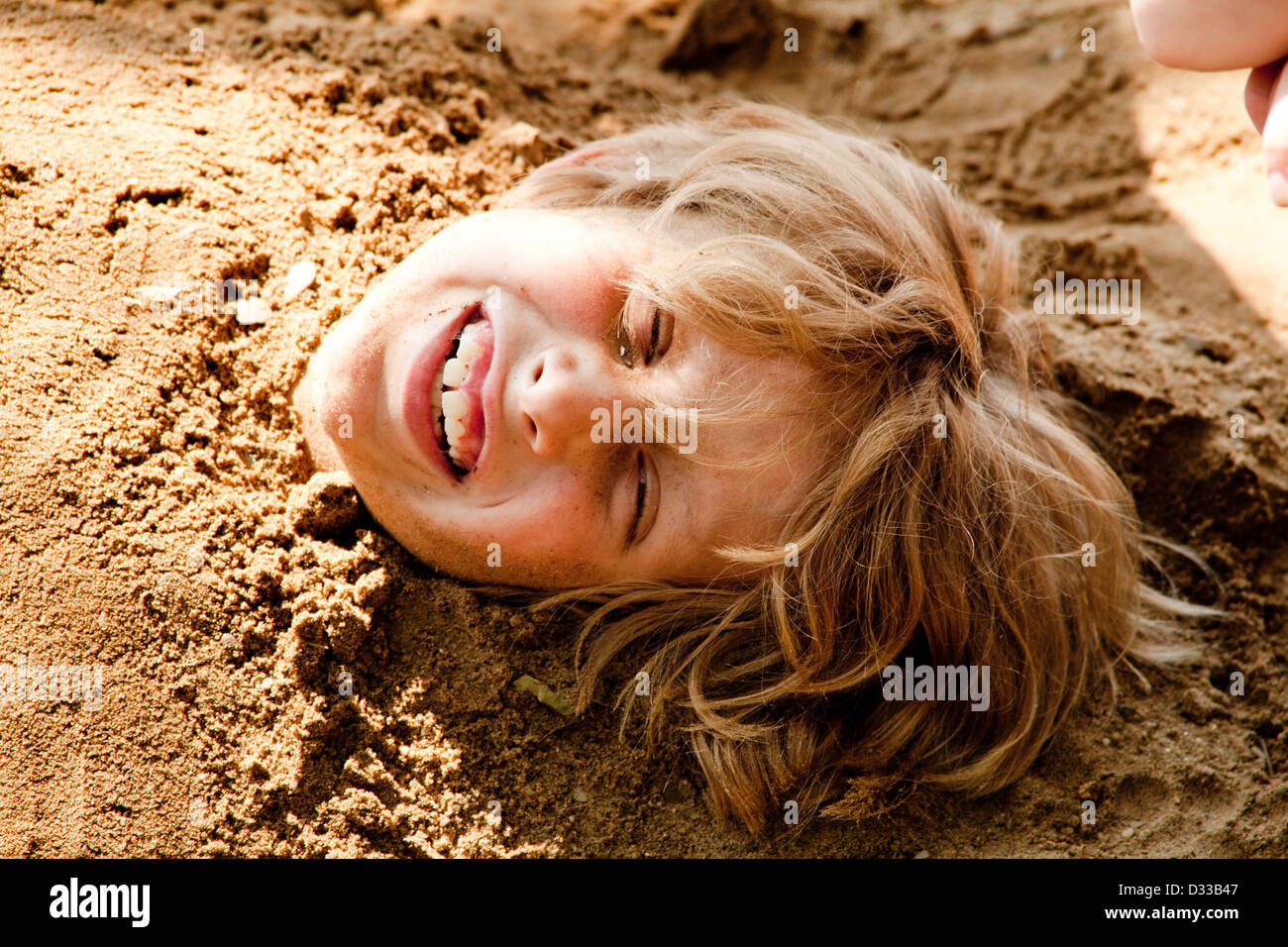 Buried up to neck hi-res stock photography and images - Alamy