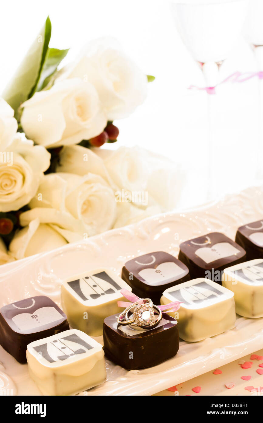 Small chocolates decorated for the wedding party Stock Photo - Alamy