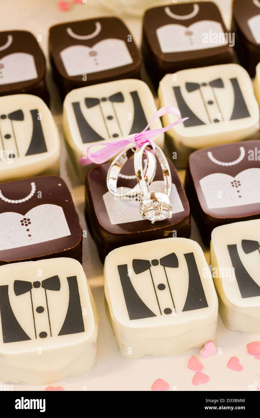 Small chocolates decorated for the wedding party Stock Photo - Alamy
