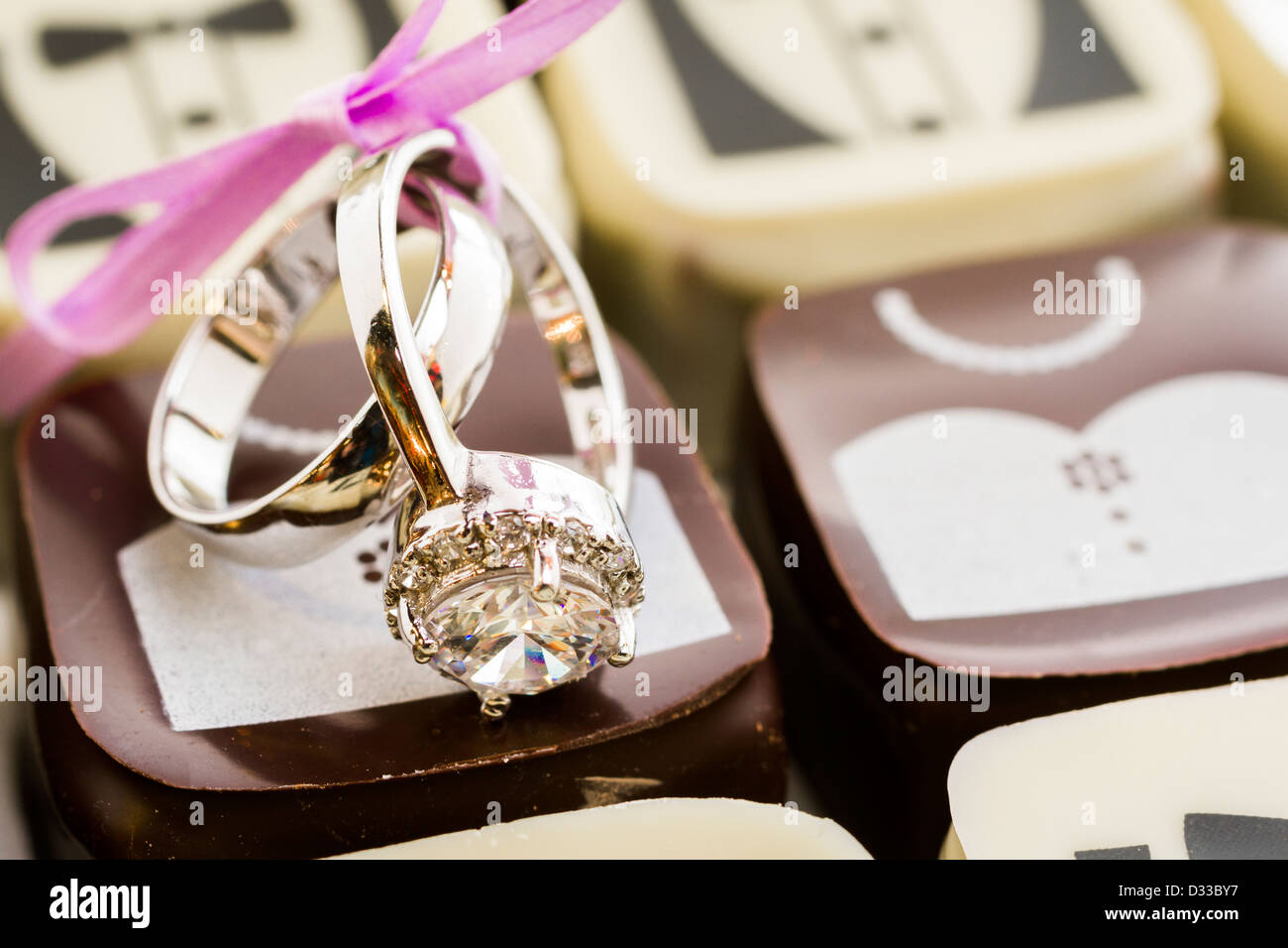 Small chocolates decorated for the wedding party Stock Photo - Alamy