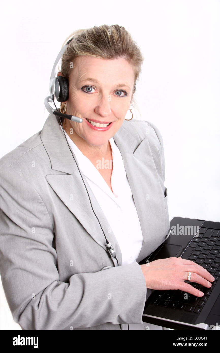A business customer service woman on a computer Stock Photo - Alamy