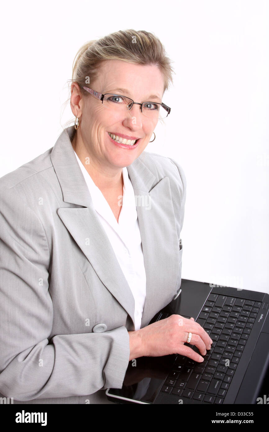 A business woman on a laptop computer Stock Photo - Alamy