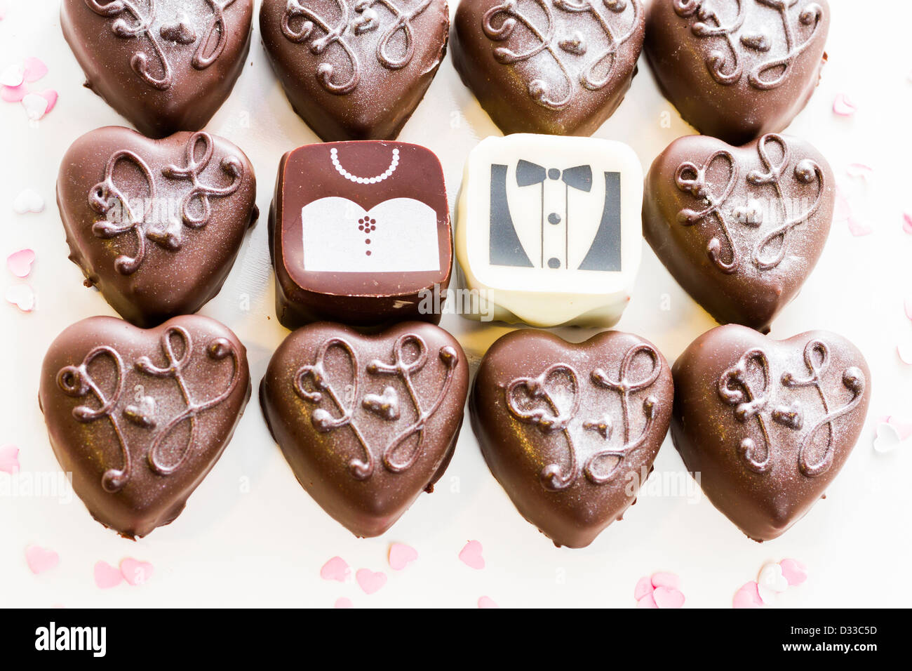 Small chocolates decorated for the wedding party Stock Photo - Alamy