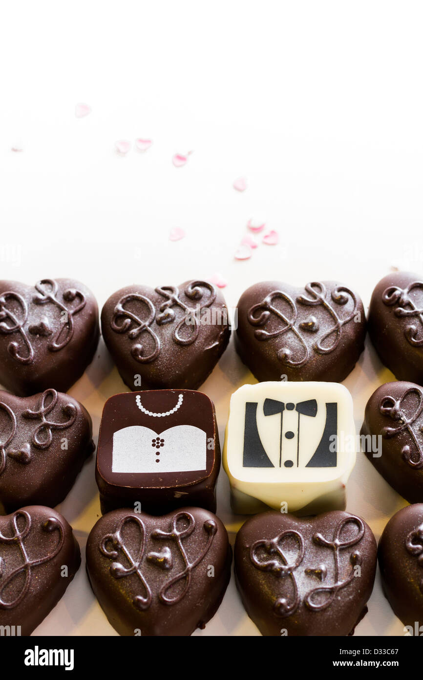 Small chocolates decorated for the wedding party Stock Photo - Alamy