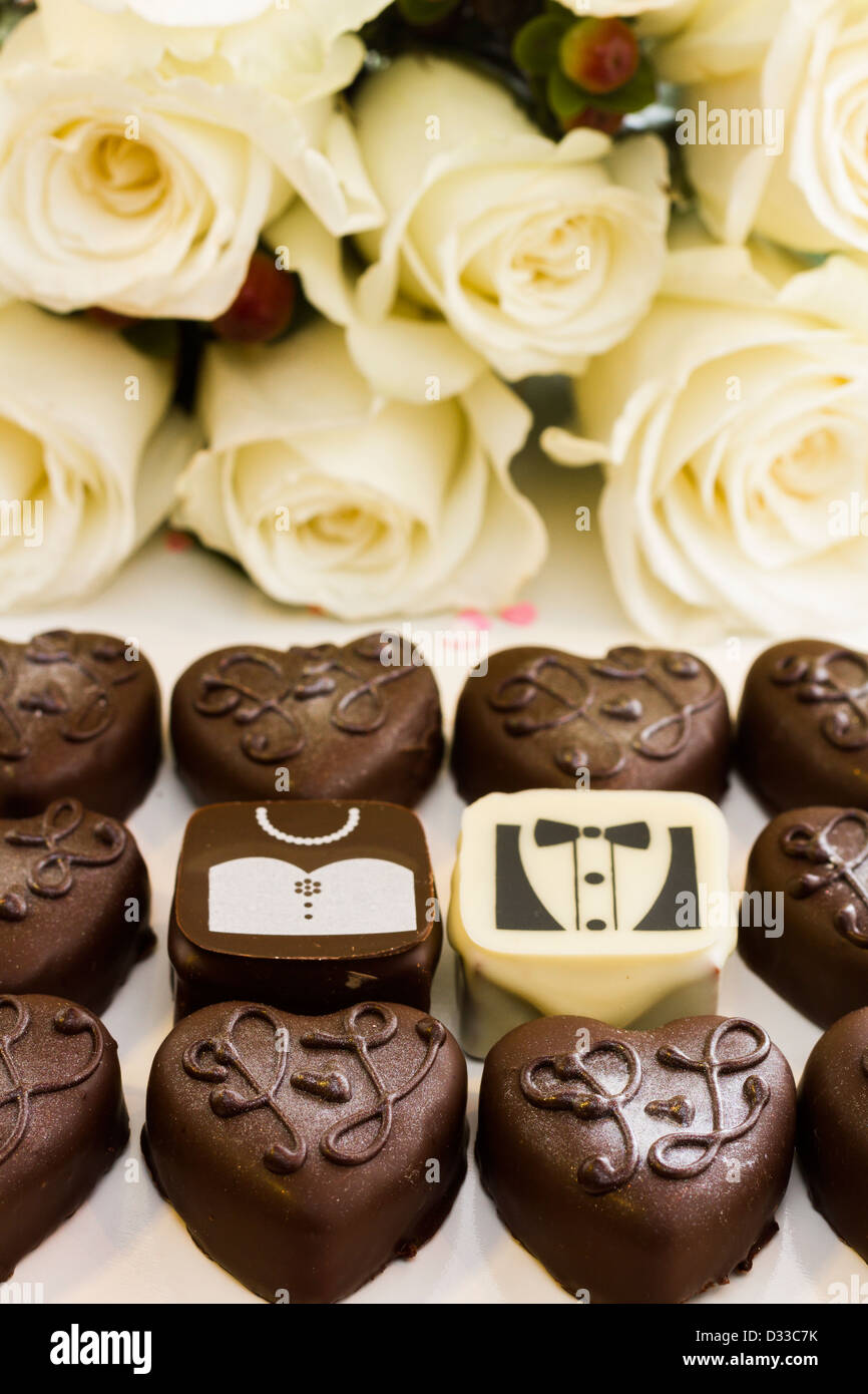Small chocolates decorated for the wedding party Stock Photo - Alamy