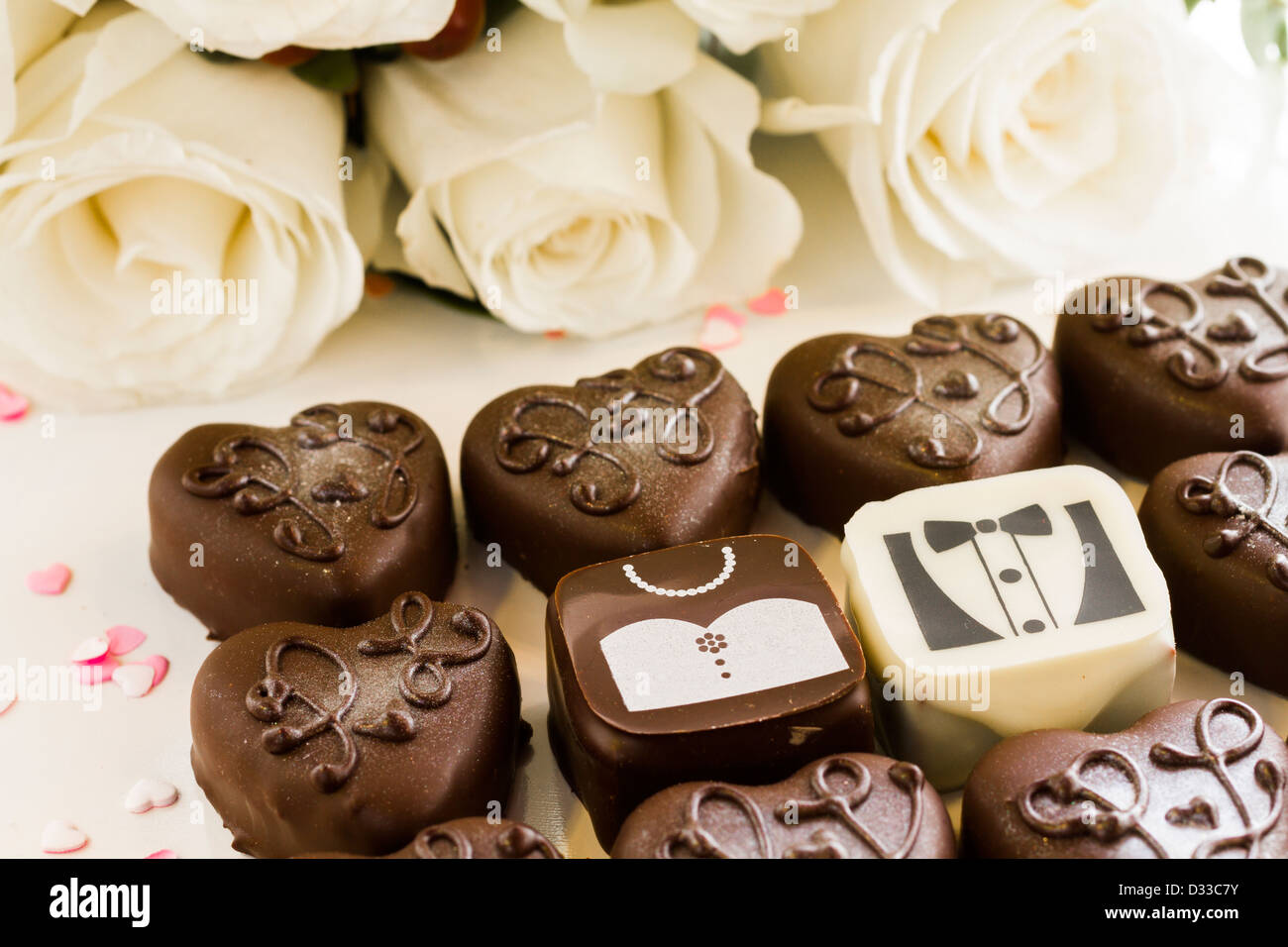 Small chocolates decorated for the wedding party Stock Photo - Alamy