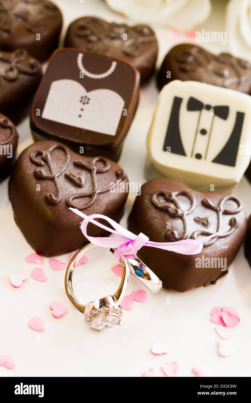 Small chocolates decorated for the wedding party Stock Photo - Alamy