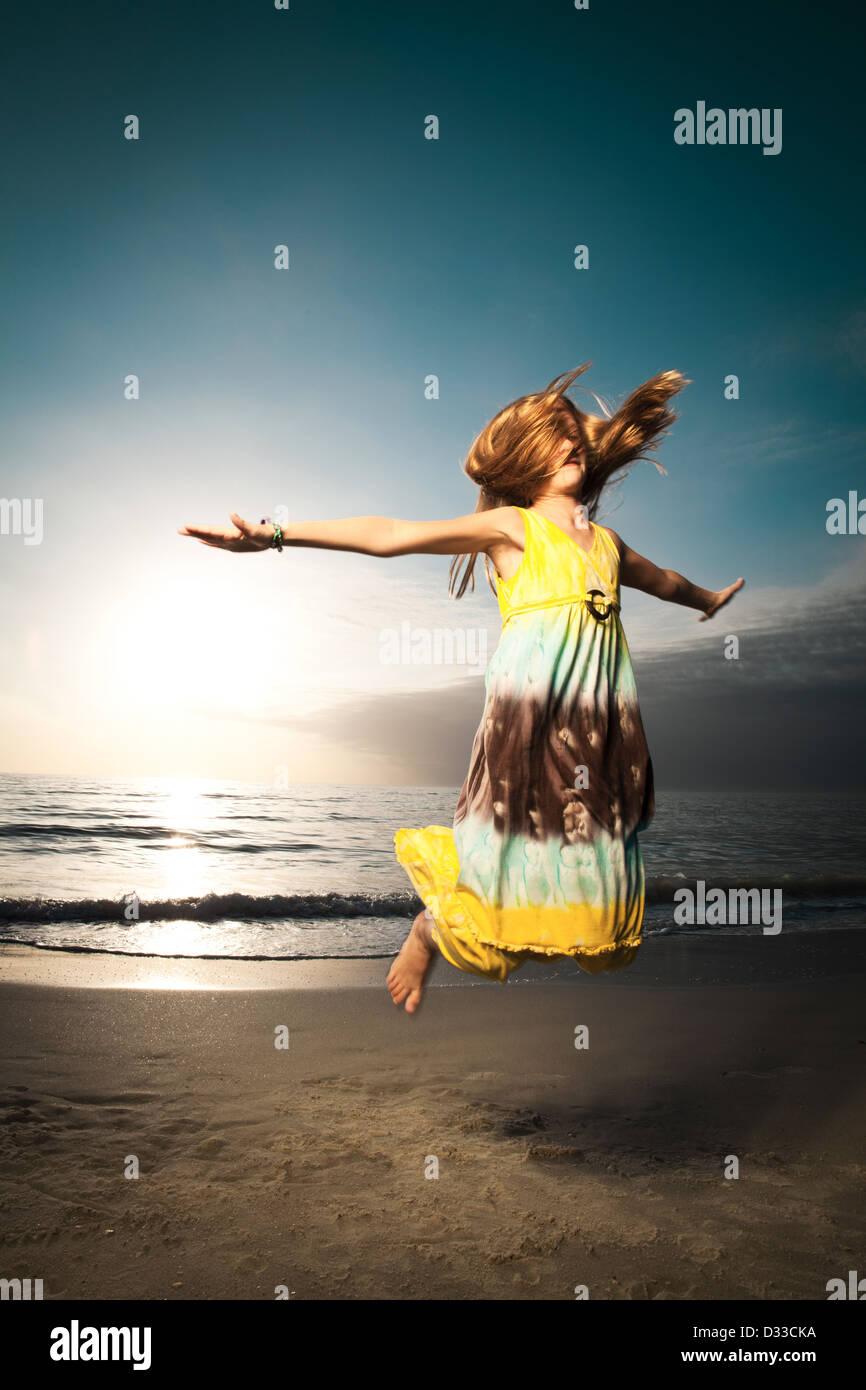 Beautiful woman dancing beach hi-res stock photography and images - Alamy