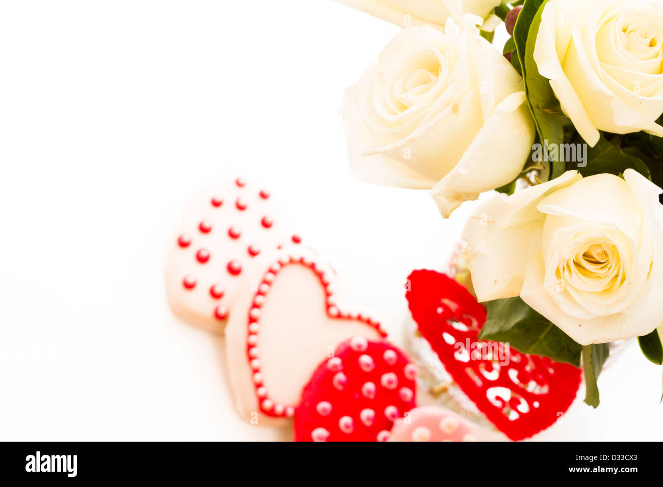 Gourmet cookies with bouquet of white roses Stock Photo - Alamy