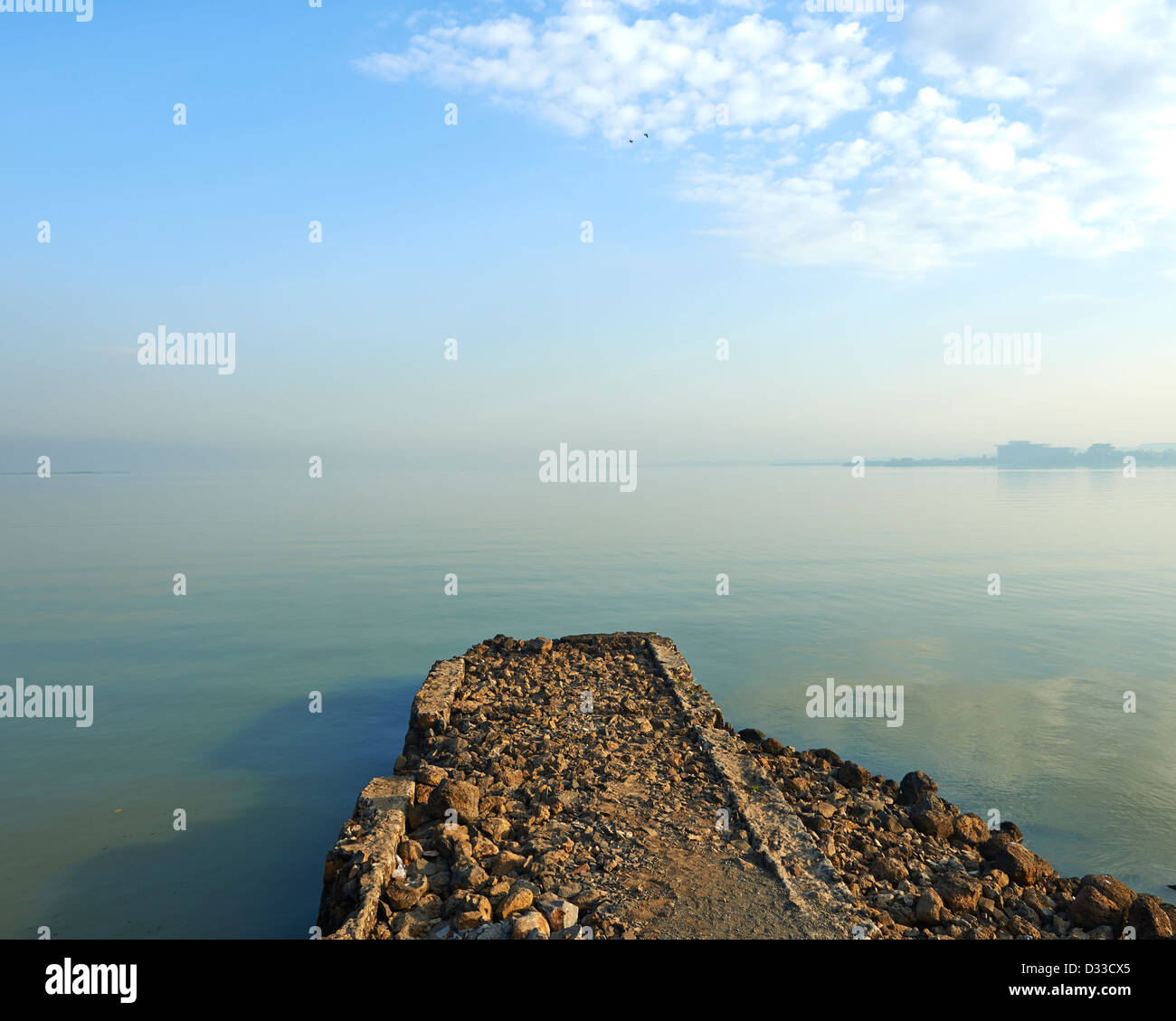 An old rocky dock on the shores of Lake Tana at sunrise Stock Photo - Alamy