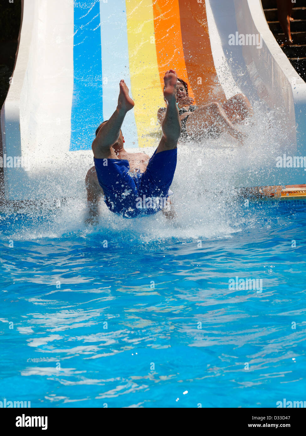 Tourists enjoy waterslides at Caliente Bodrum Resort Hotel. Torba ...