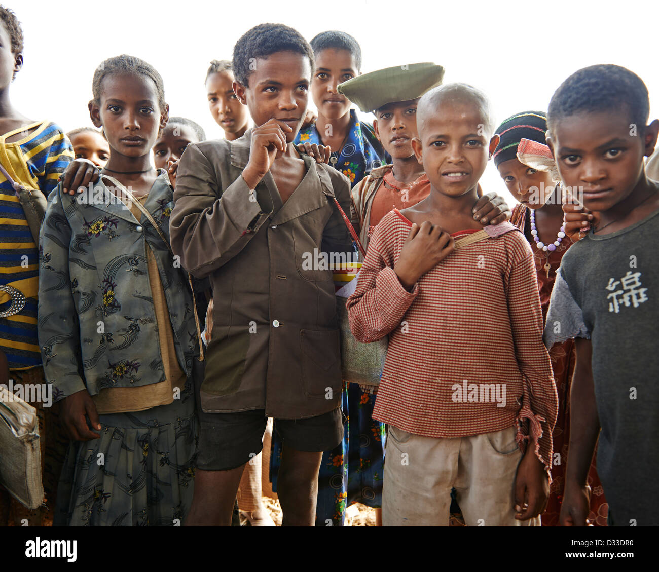 A group of local children making faces and posing for the camera Stock ...