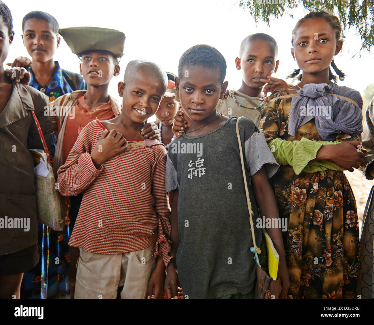A group of local children making faces and posing for the camera Stock ...