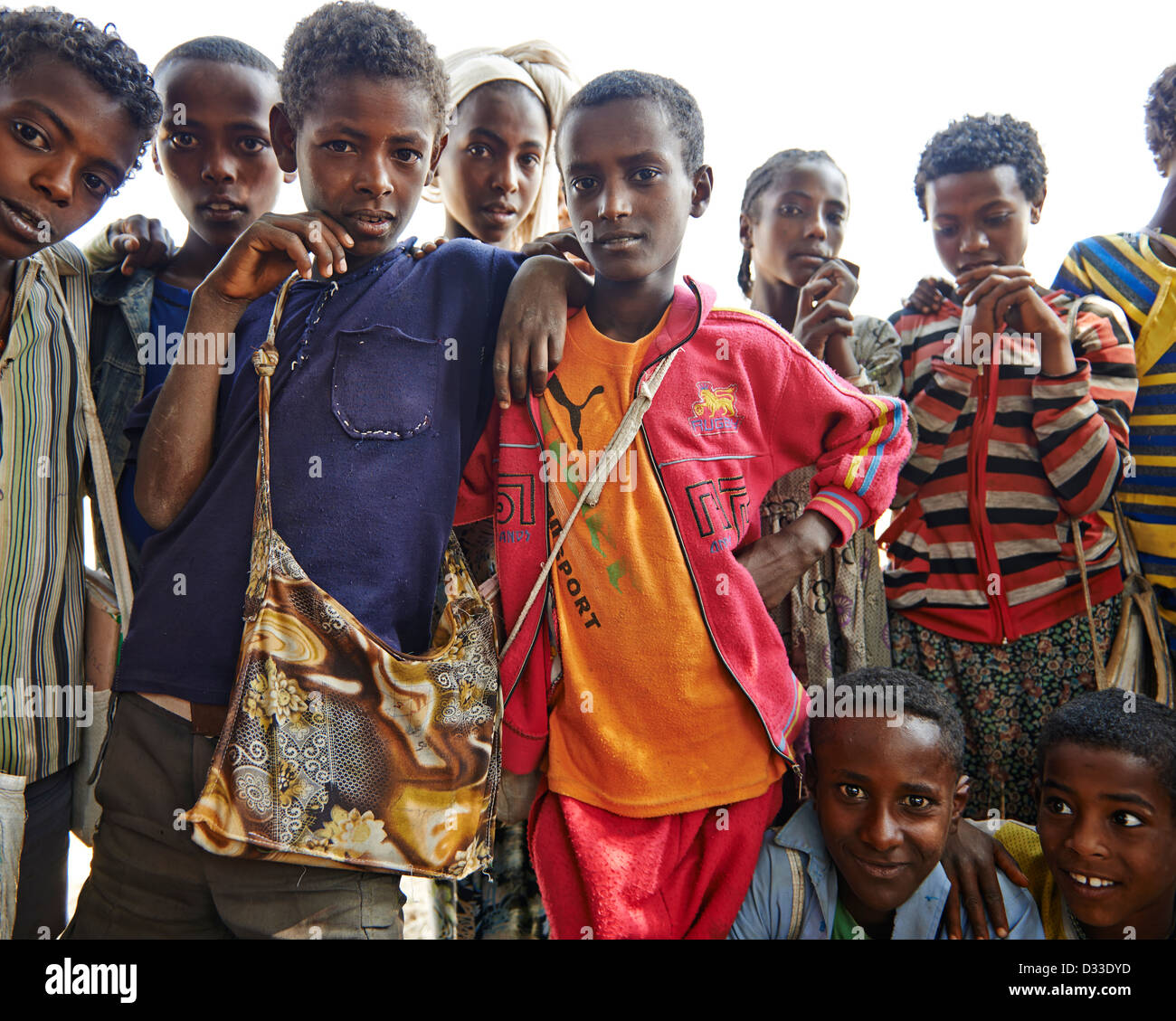 A group of local children making faces and posing for the camera Stock ...