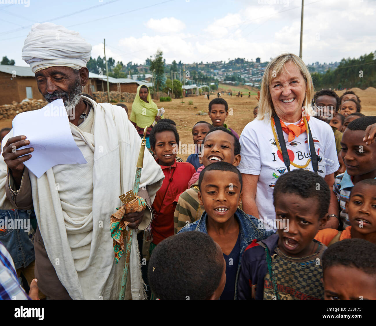Margaret D. Lowman or "Canopy Meg" poses with a group of children and a ...
