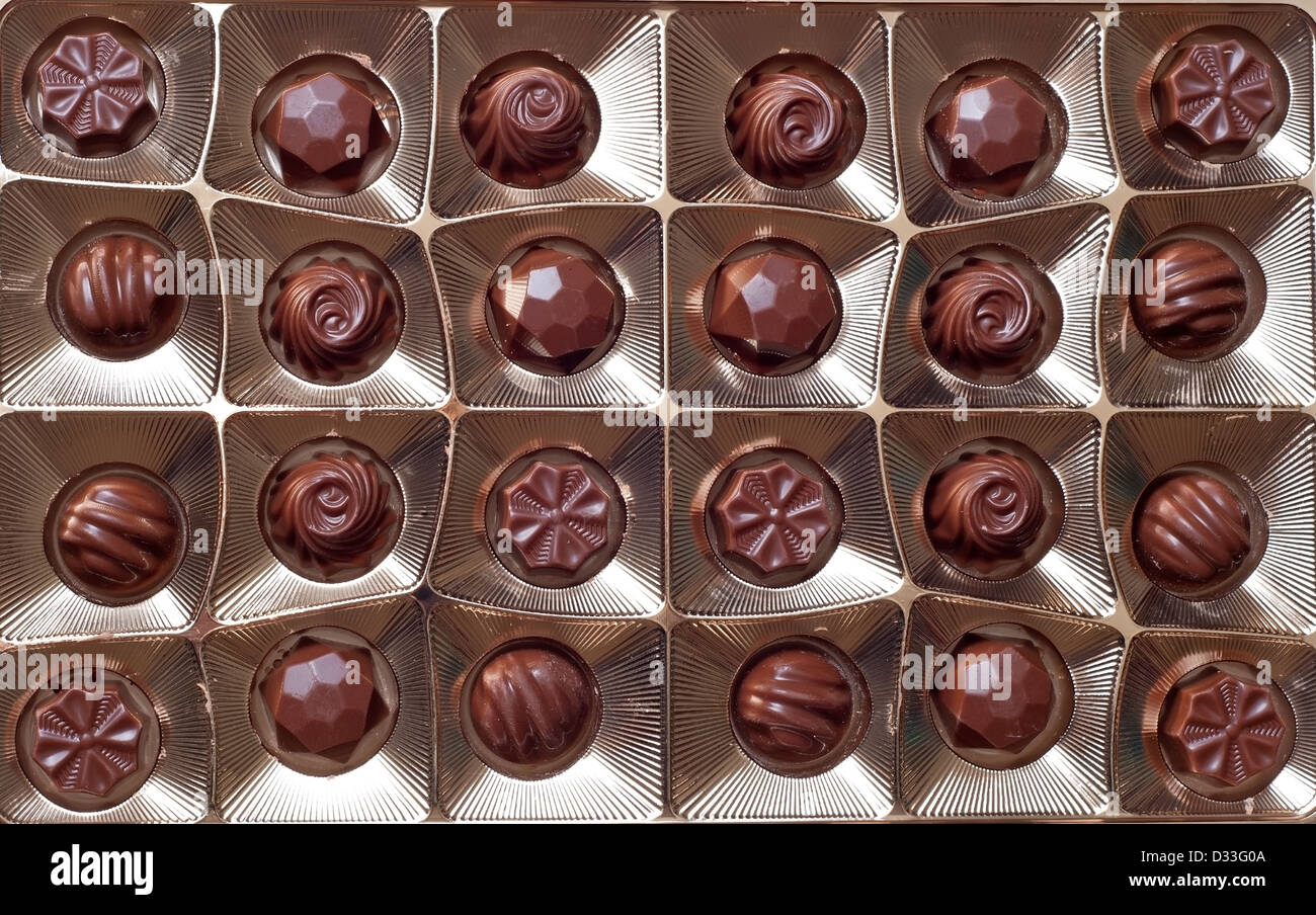 chocolates on gold pack Stock Photo - Alamy